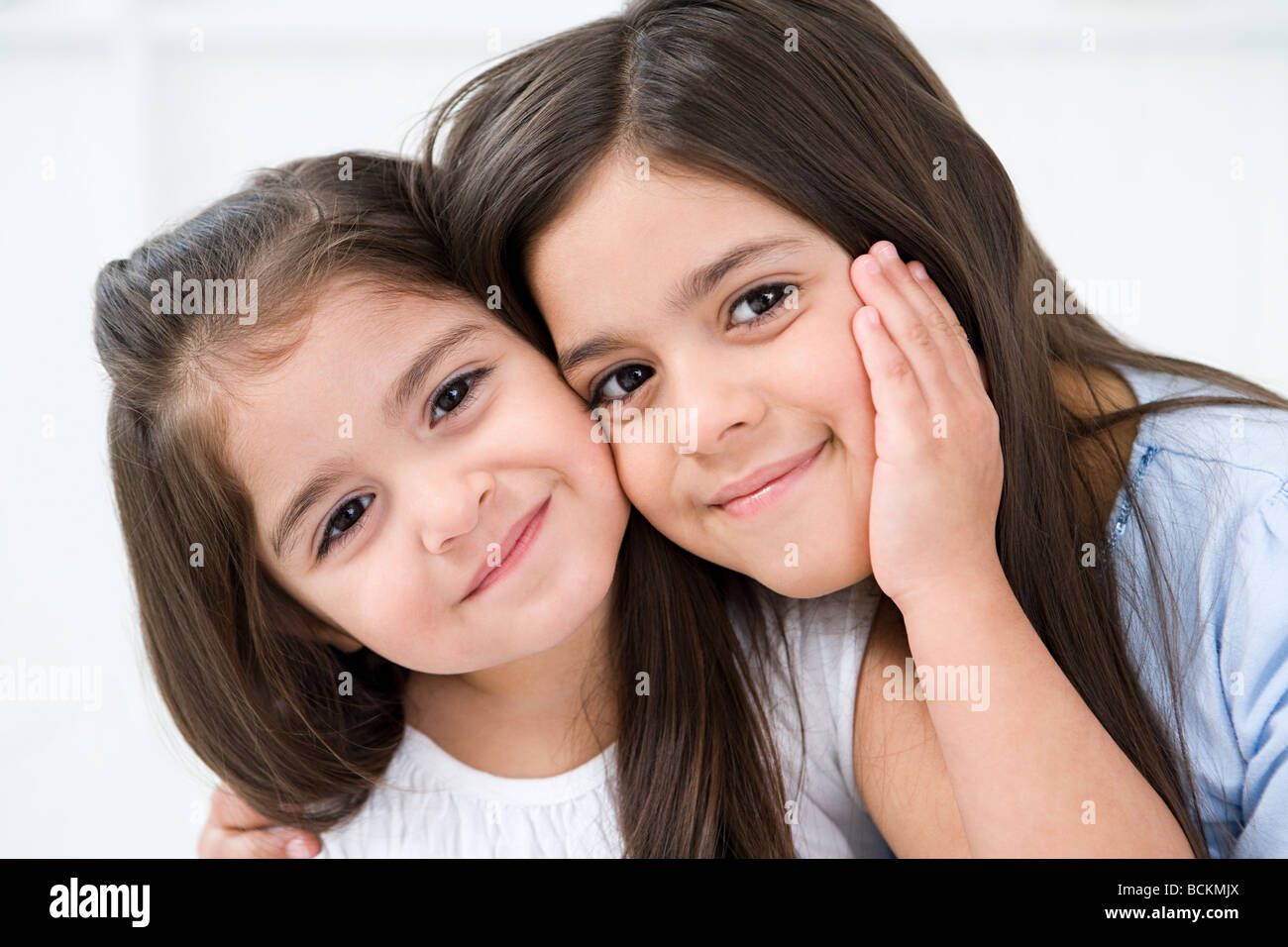 Portrait of two hispanic sisters Stock Photo - Alamy