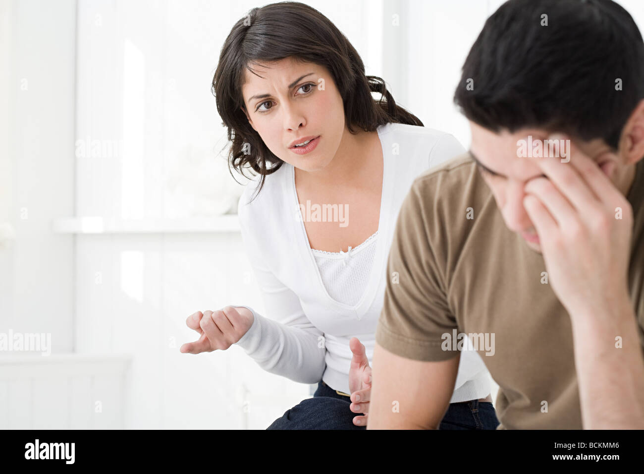 Hispanic couple arguing Stock Photo - Alamy