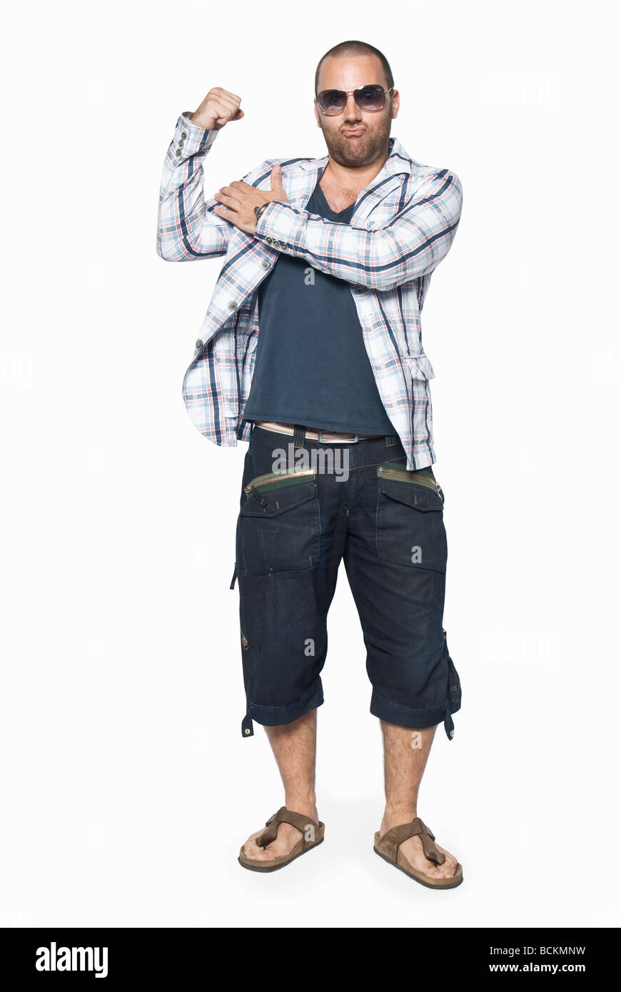 Flexing his arm Cut Out Stock Images & Pictures - Alamy