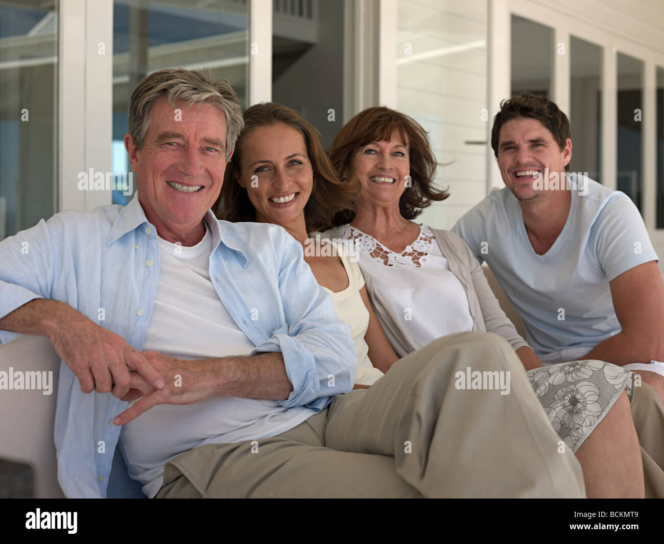 Couple in family Stock Photo - Alamy
