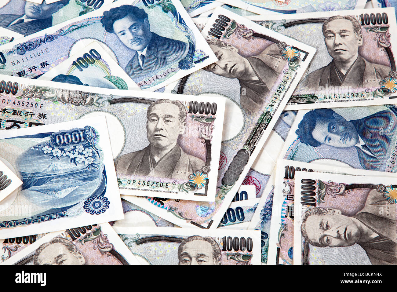 Many Japanese yen currency notes Stock Photo - Alamy