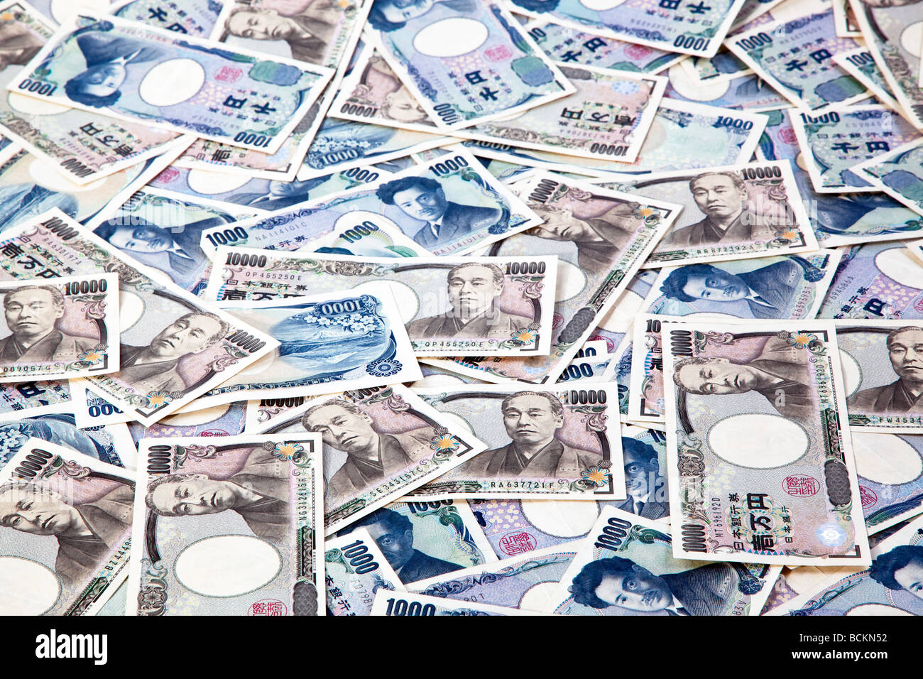 Many Japanese yen currency notes Stock Photo - Alamy