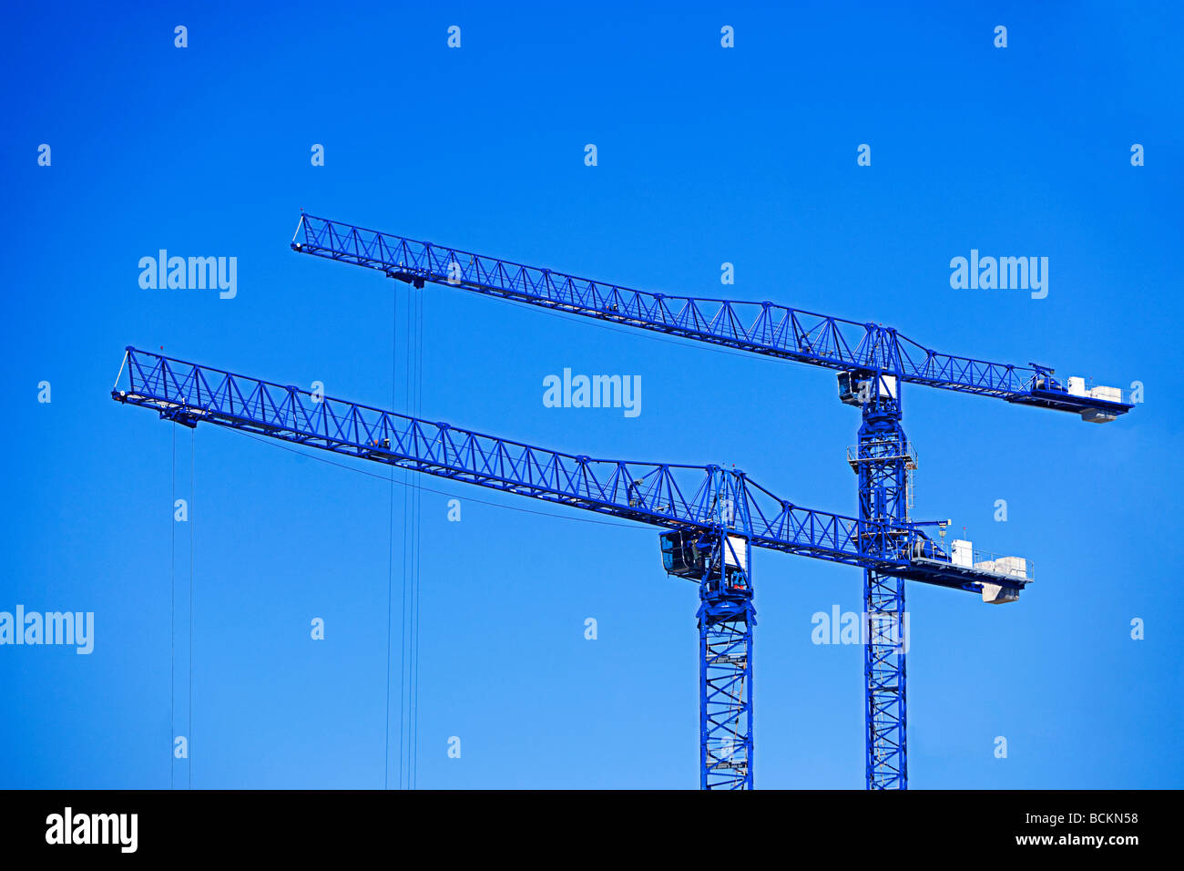 Two cranes hi-res stock photography and images - Alamy