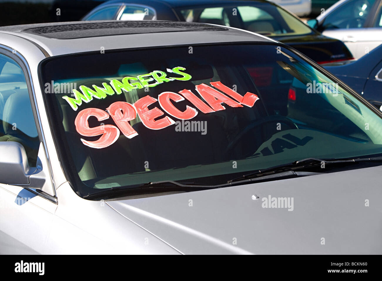 Sign in car window Stock Photo - Alamy
