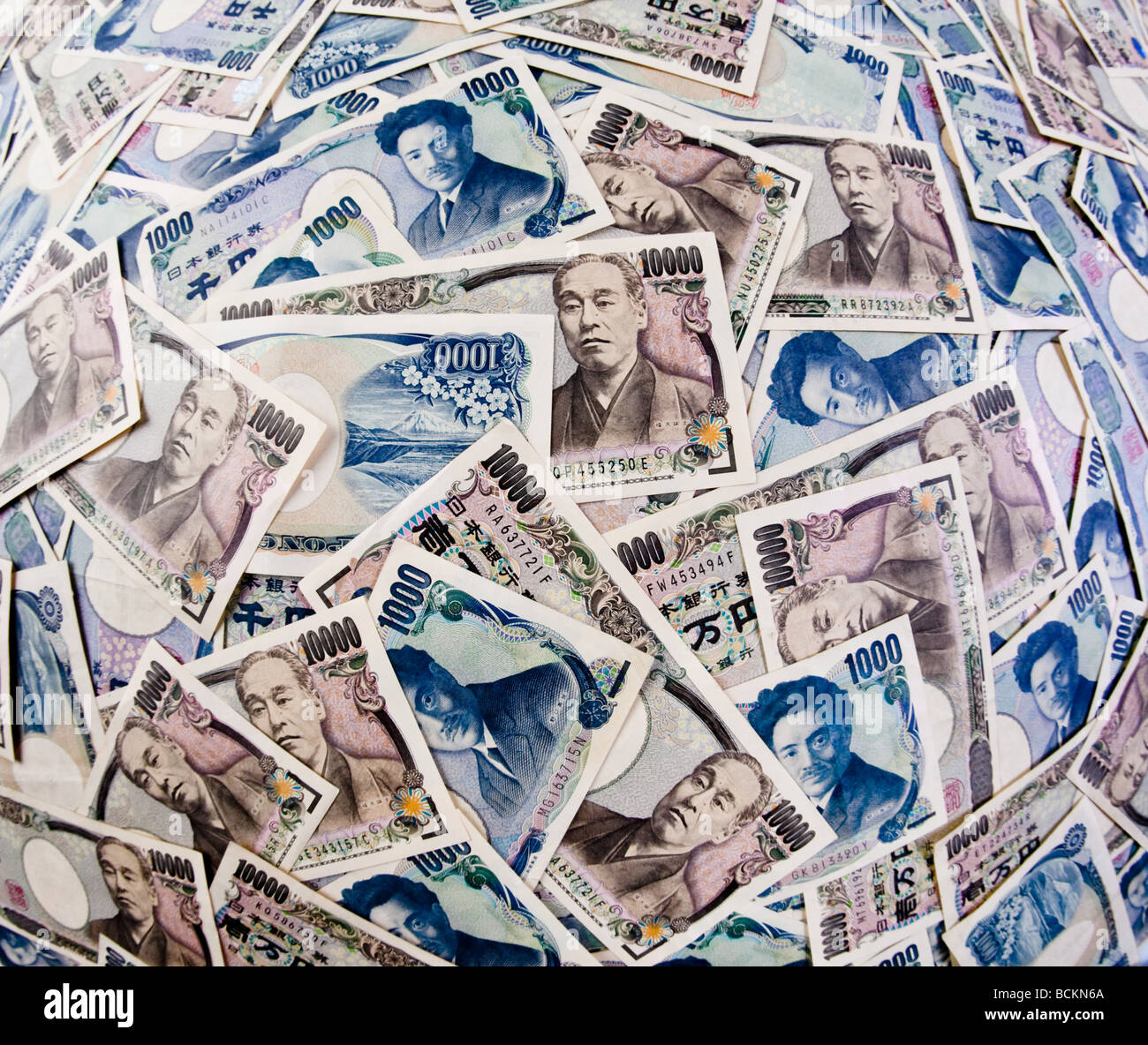 Many Japanese yen currency notes Stock Photo - Alamy