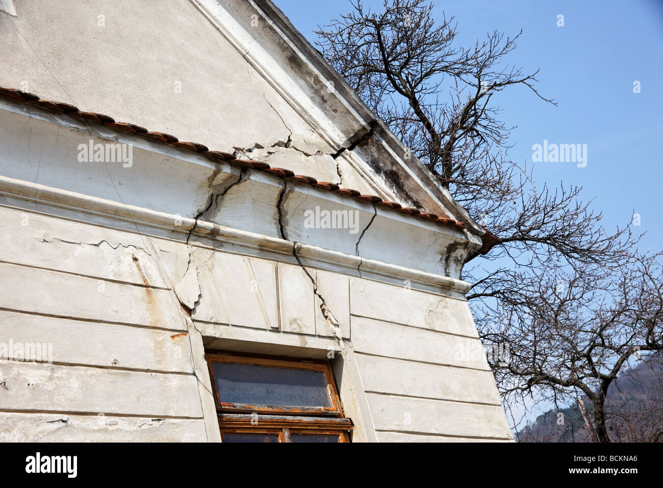 Serious damage to the construction of a house gable Stock Photo - Alamy