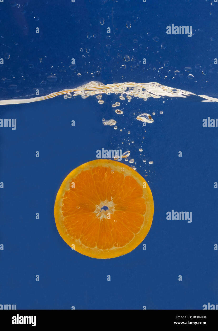 orange slice splash Stock Photo - Alamy