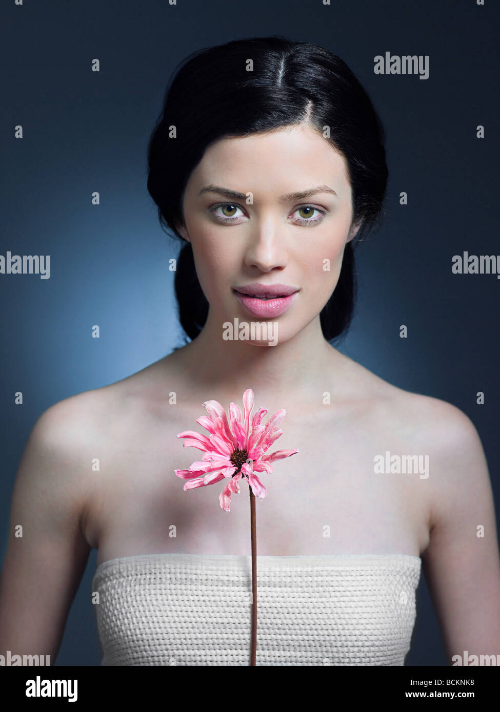 Young woman with flower Stock Photo - Alamy