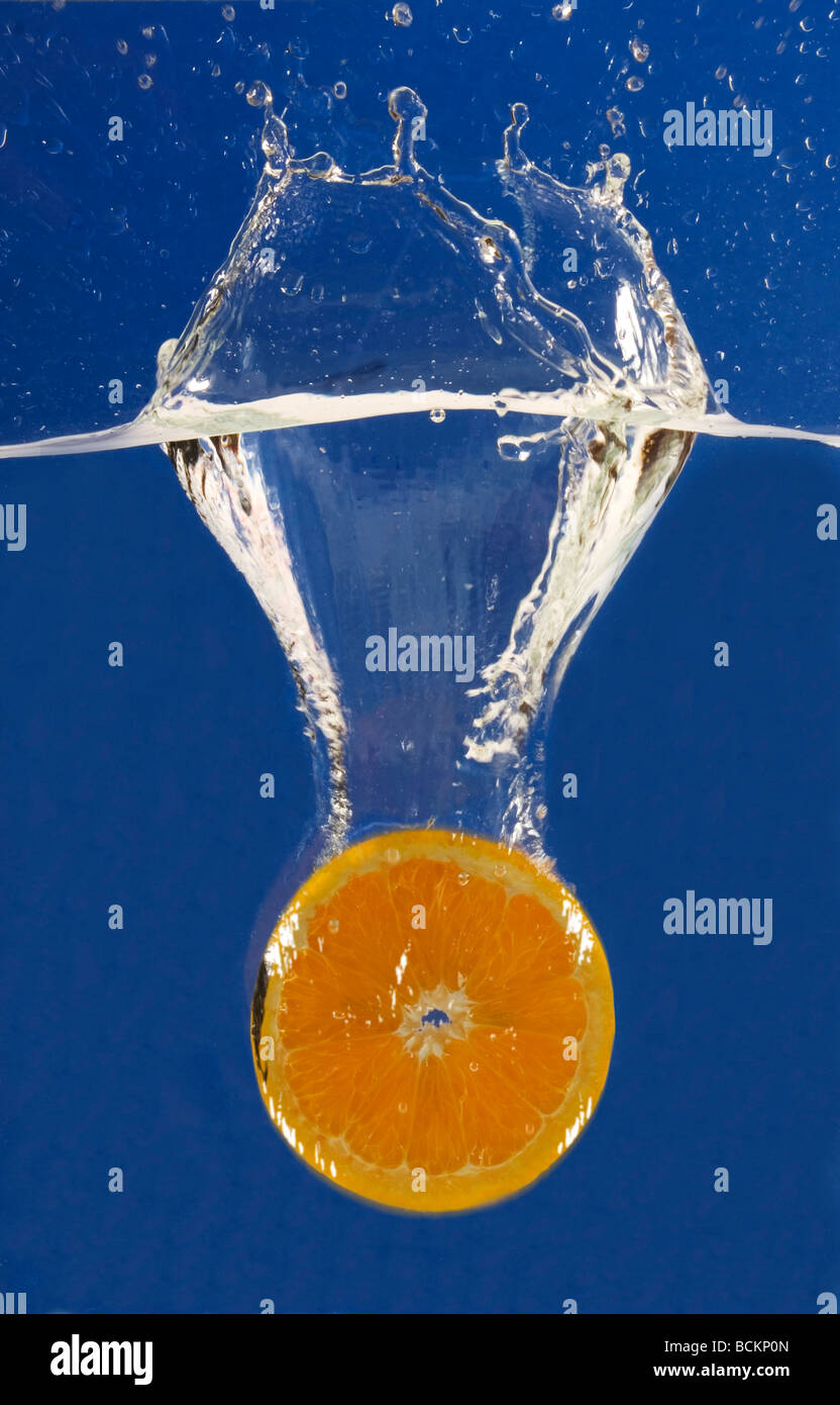 orange slice splash Stock Photo - Alamy