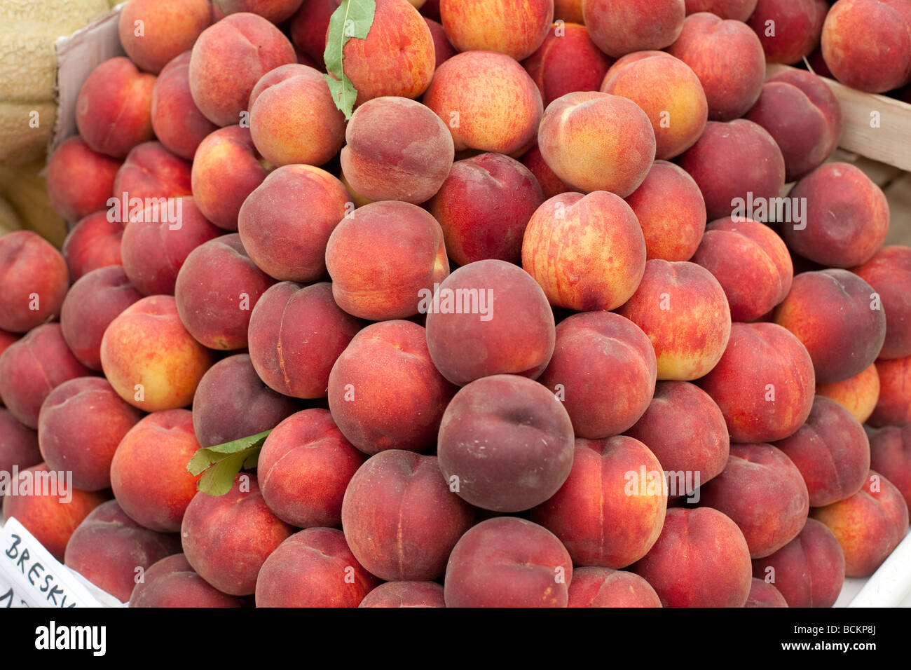 Naturally grown fruits sold on the market Lovely fresh picked peaches ...