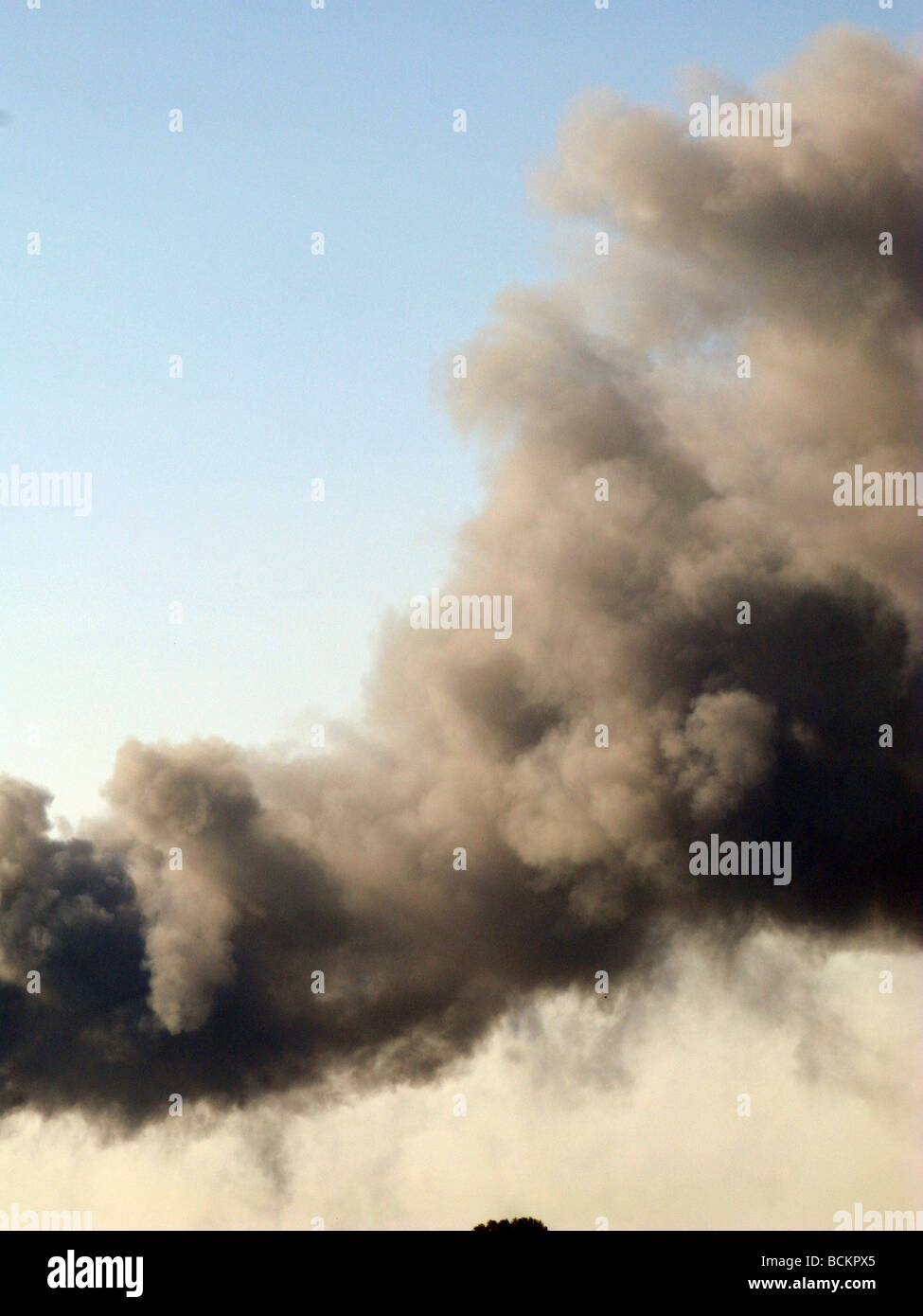 long black smoke trail in sky Stock Photo - Alamy