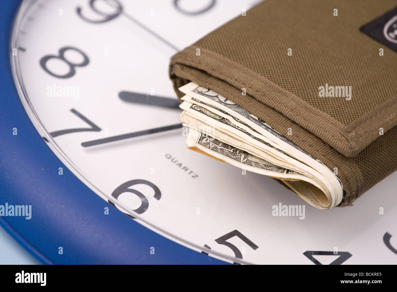 Money and clock hi-res stock photography and images - Alamy