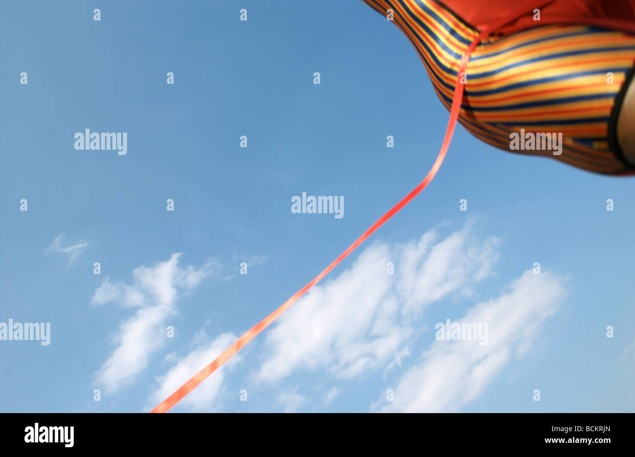 Athlete crossing finishing line, partial view Stock Photo - Alamy