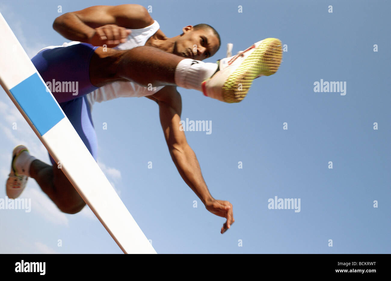 Runners jumping hurdles hi-res stock photography and images - Alamy