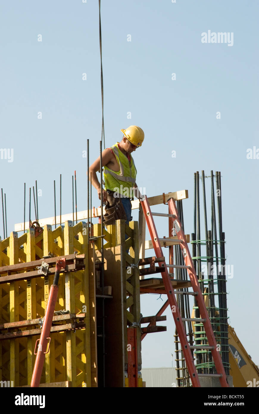 construction worker assembling forms for a concrete wall Stock Photo ...