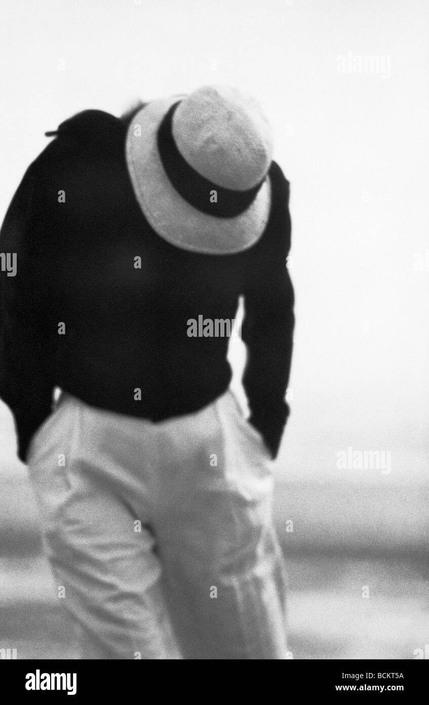 Woman in black hat walks hi-res stock photography and images - Alamy