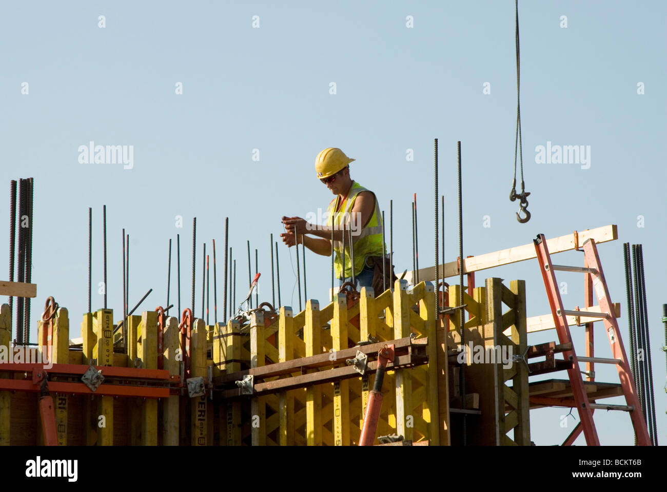 construction worker assembling forms for a concrete wall Stock Photo ...