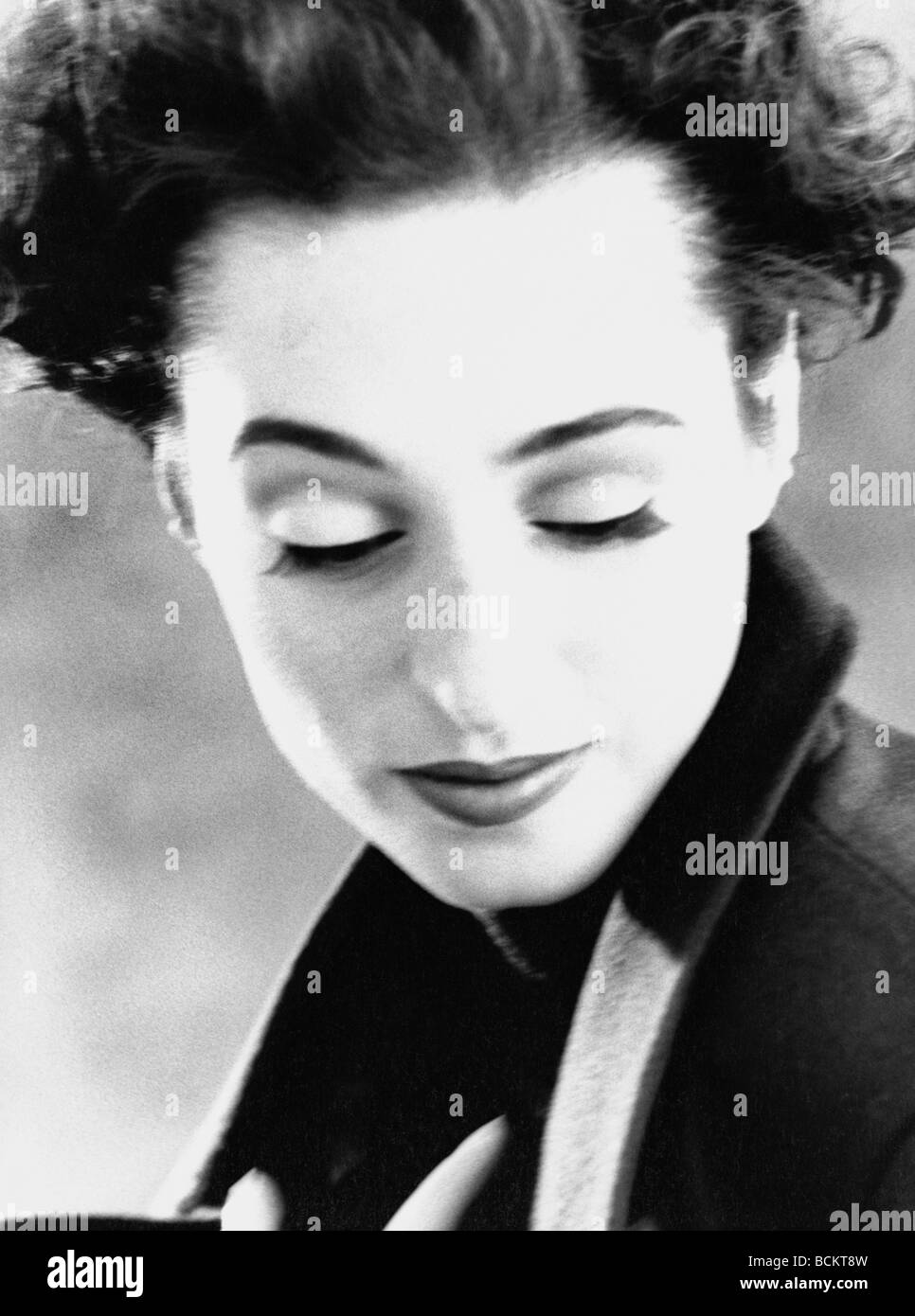 Woman looking down, portrait, b&w Stock Photo - Alamy