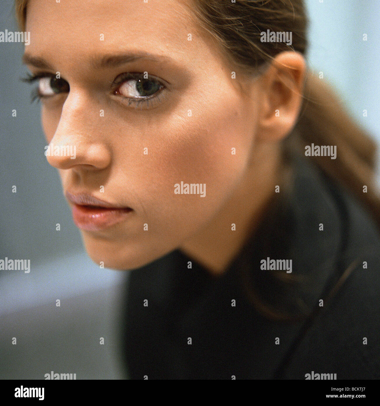 Woman looking at camera, portrait Stock Photo - Alamy