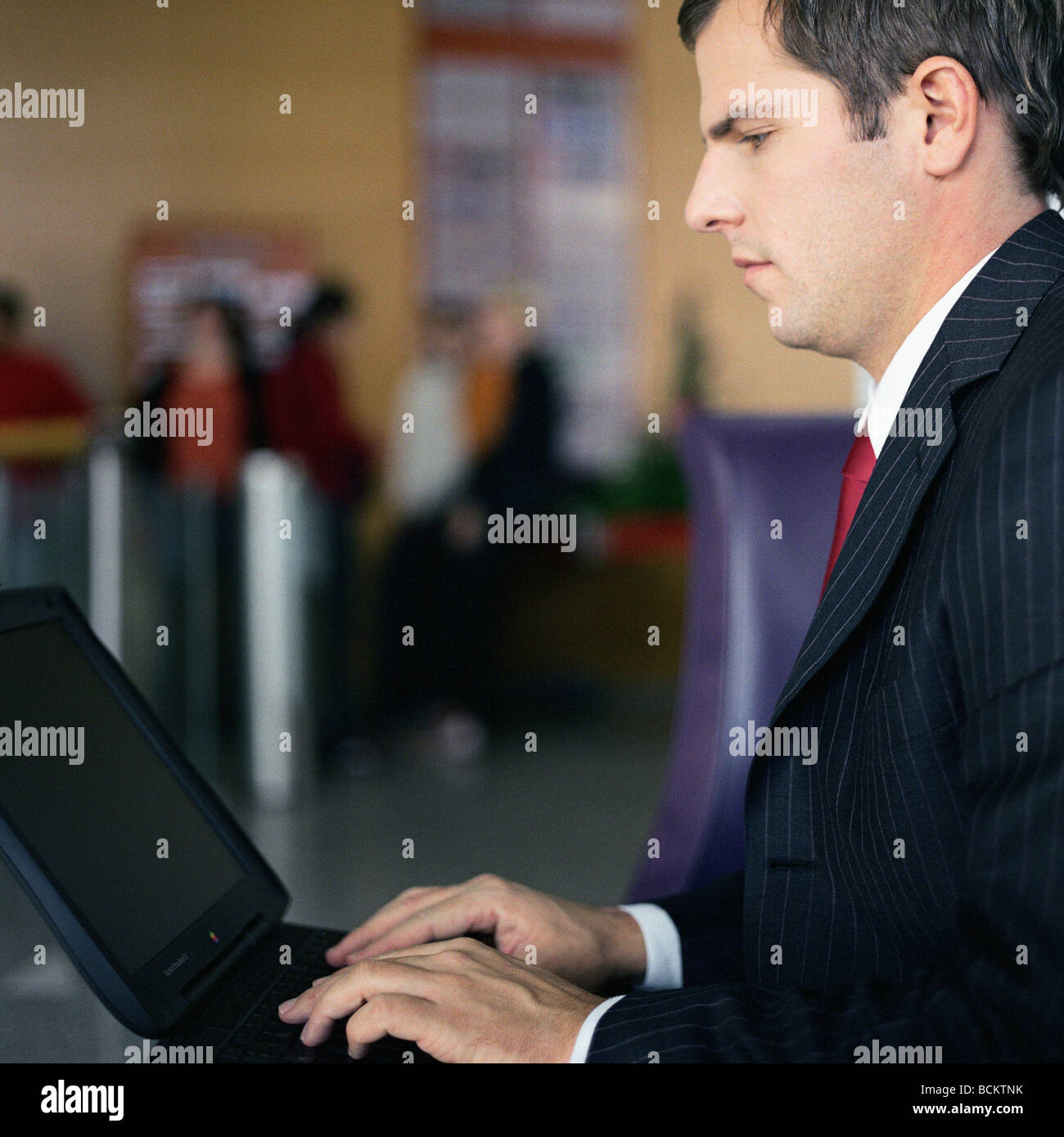Businessman using laptop Stock Photo - Alamy
