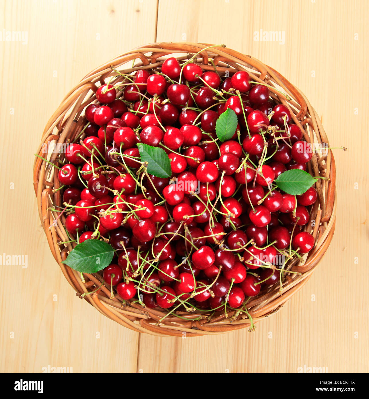 Basket of fresh red cherries Stock Photo - Alamy