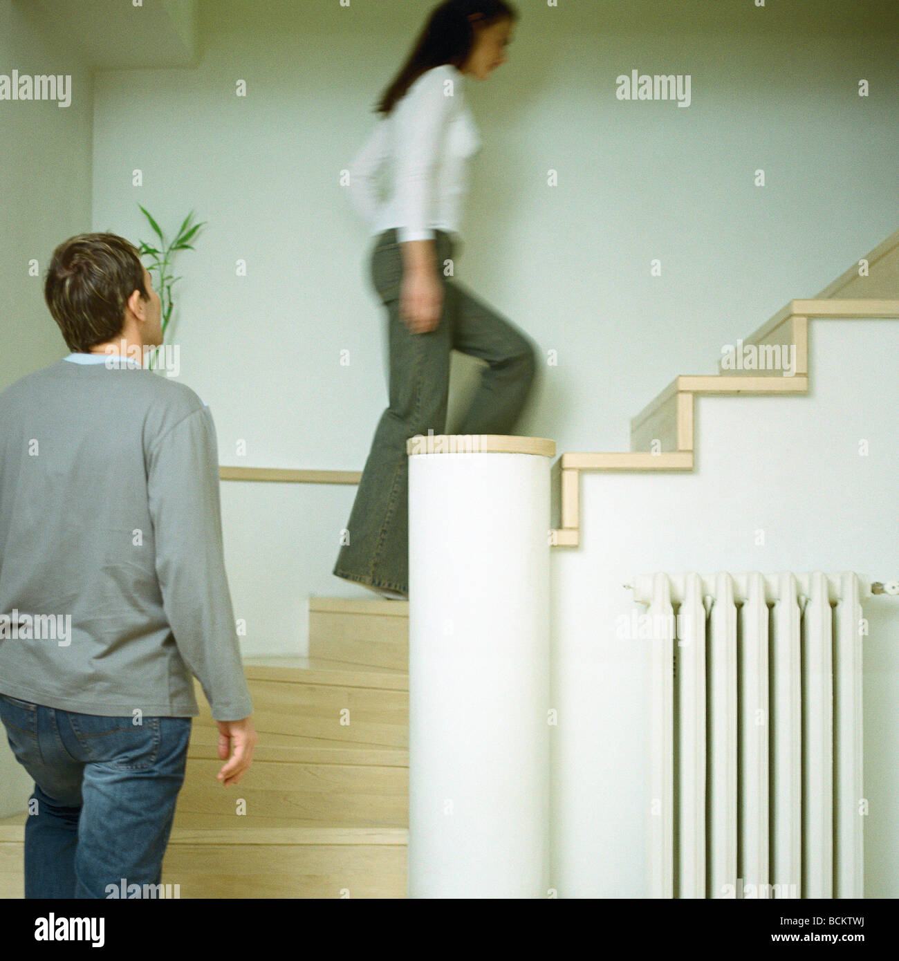 Man and woman going up steps hi-res stock photography and images - Alamy