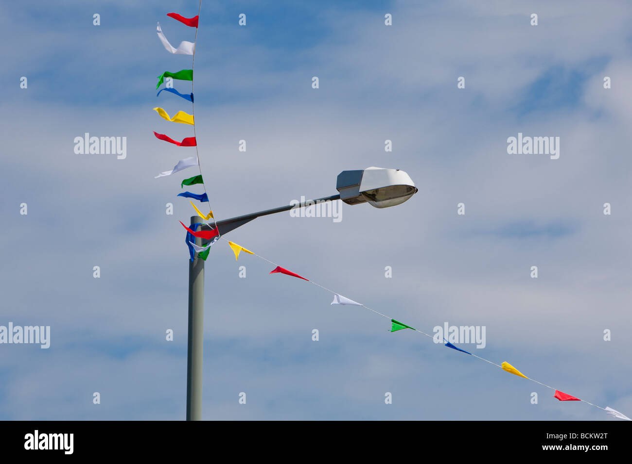 Lamp post decorated with bunting Stock Photo - Alamy