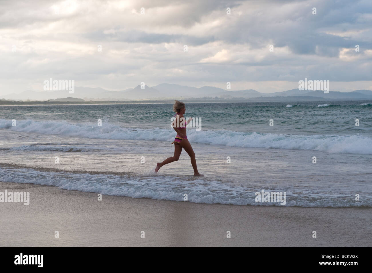 Running on beach woman australian hi-res stock photography and images ...