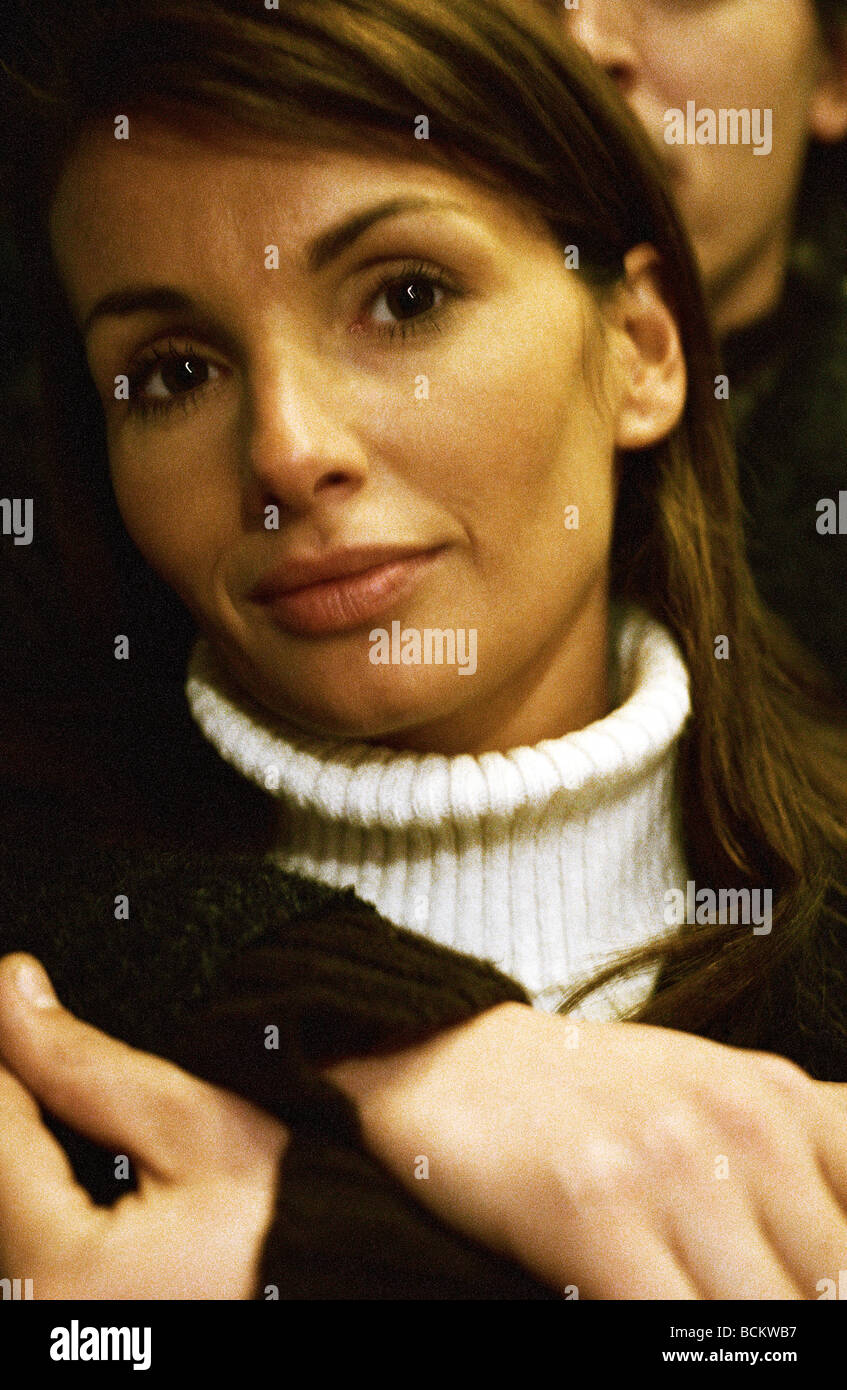 Woman with man's arms around her, close-up Stock Photo - Alamy