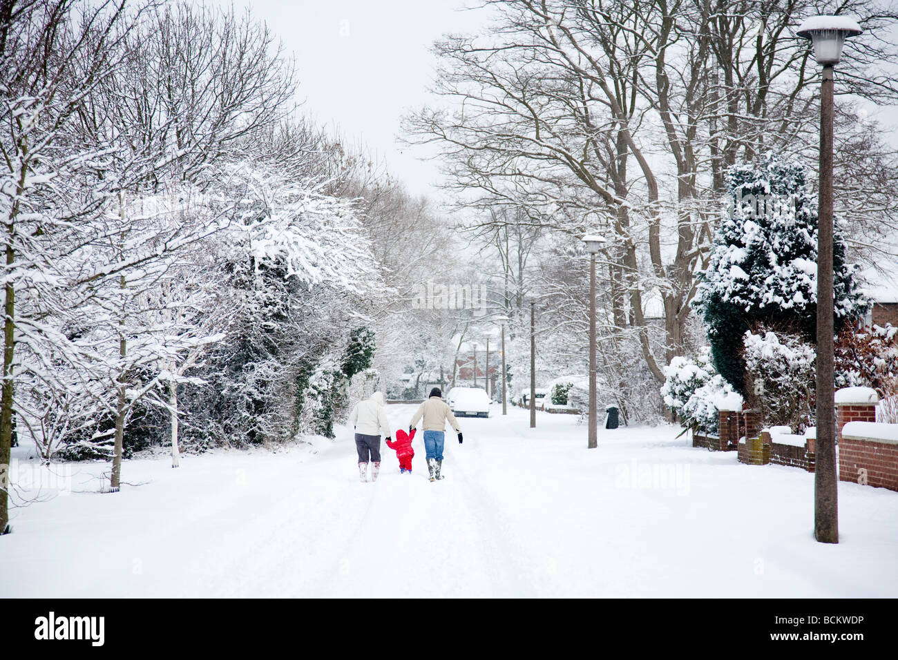 a snowy suburban street scene in Thames Ditton Surrey UK February 2009 ...