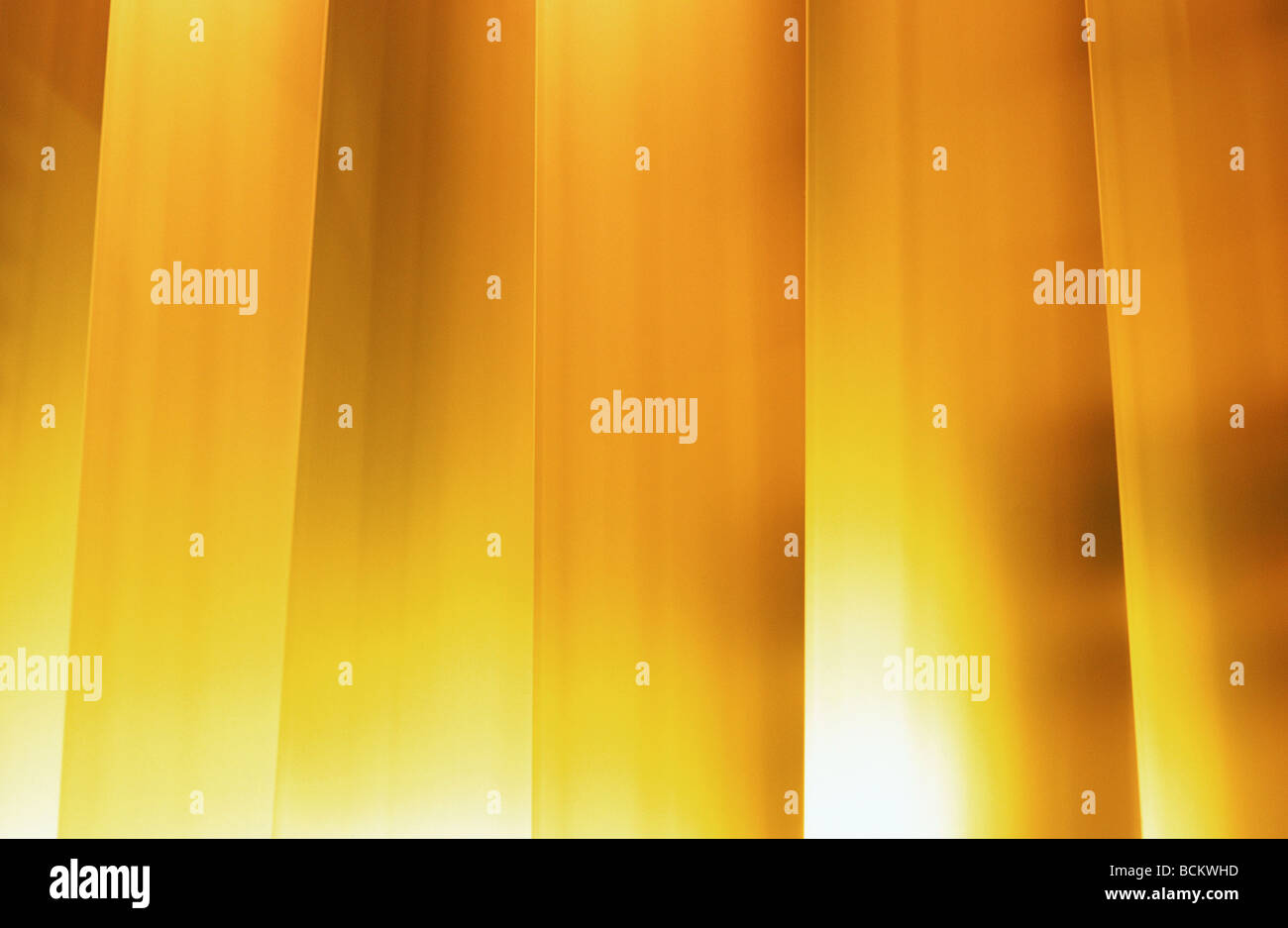 Yellow vertical blinds, close-up Stock Photo - Alamy
