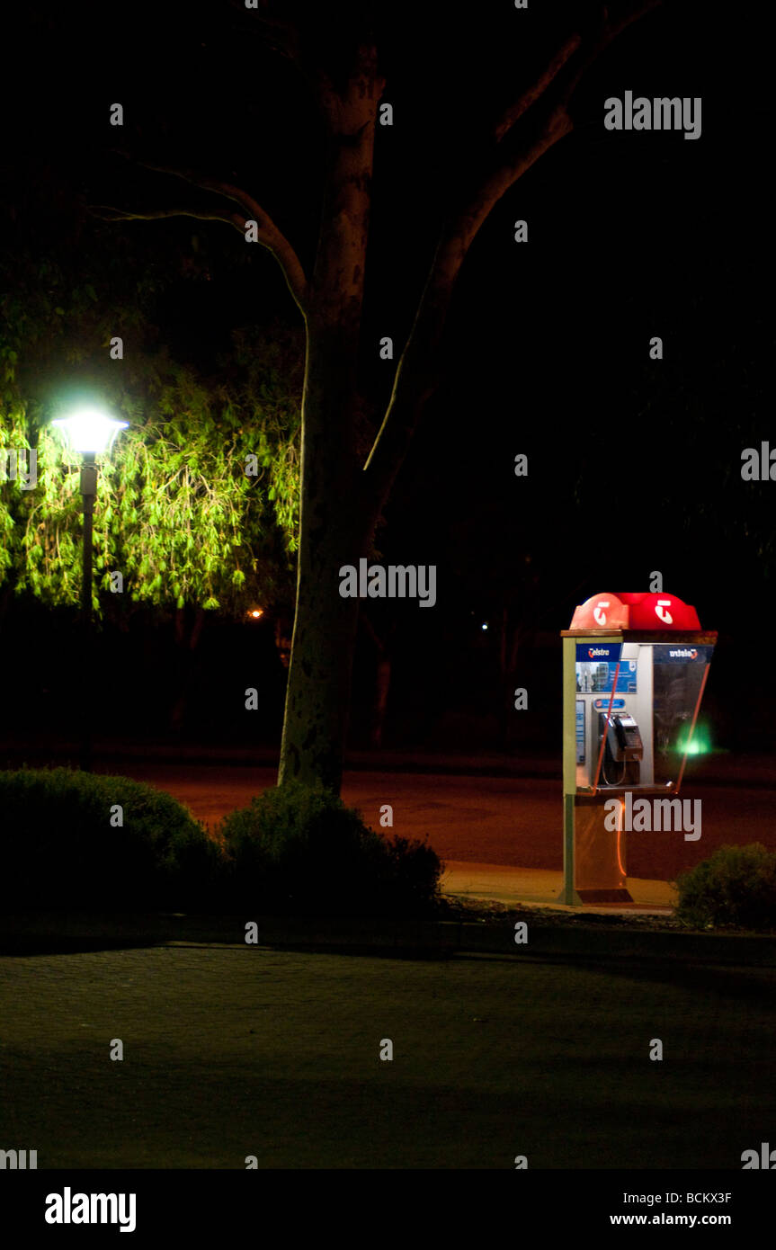 Telephone booth and tree at night Broken Hill Australia Stock Photo - Alamy