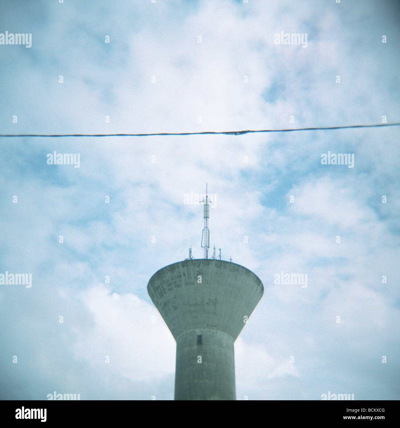Water tower and electrical line Stock Photo - Alamy