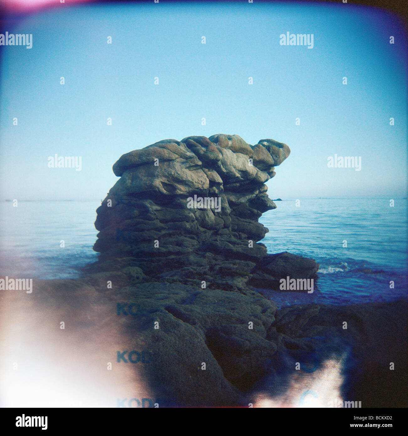 Rock formation in sea Stock Photo - Alamy