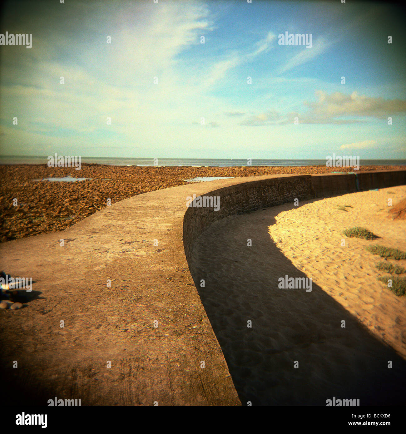 Low wall on beach Stock Photo - Alamy