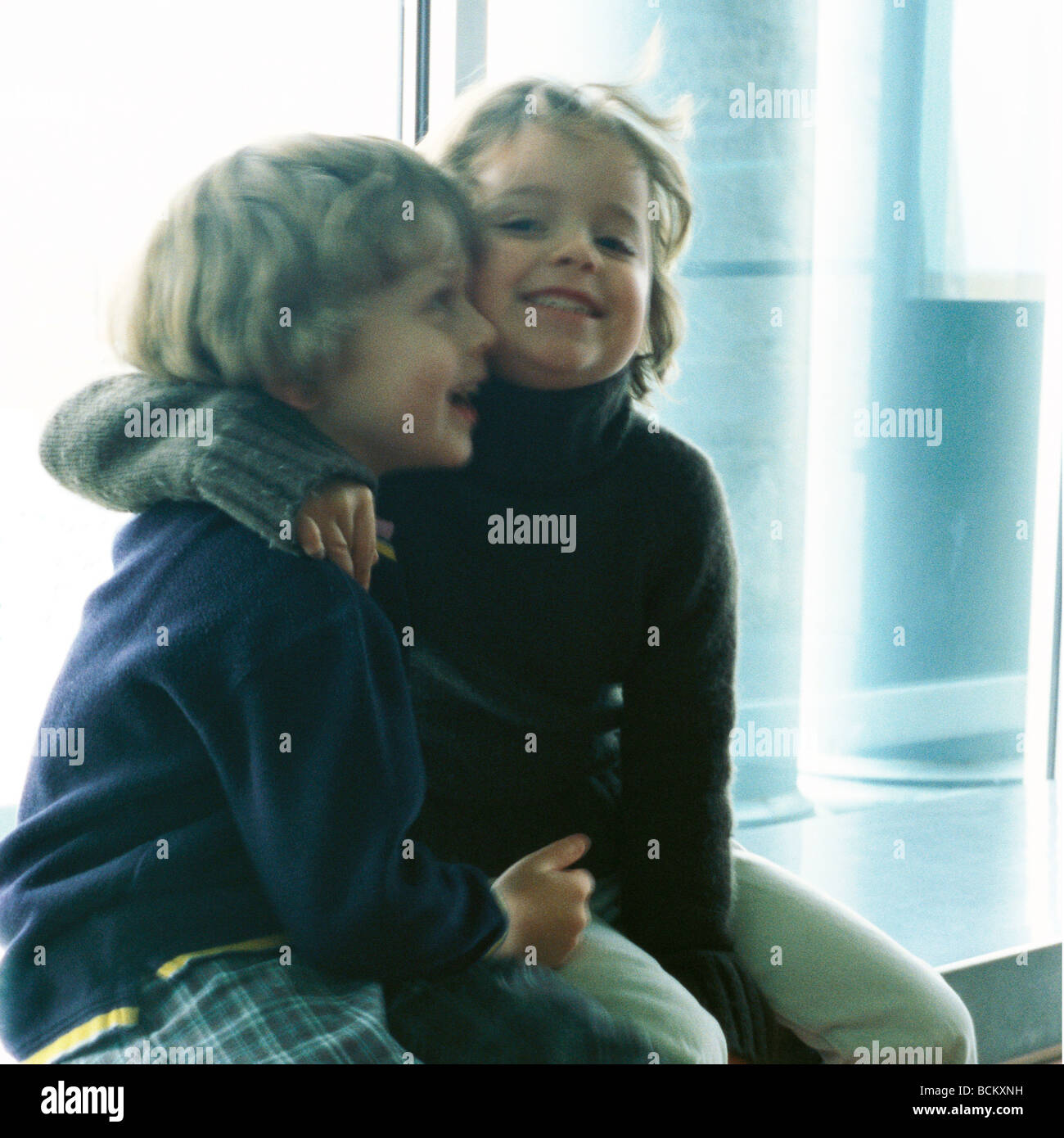 Cute siblings arms around hi-res stock photography and images - Alamy