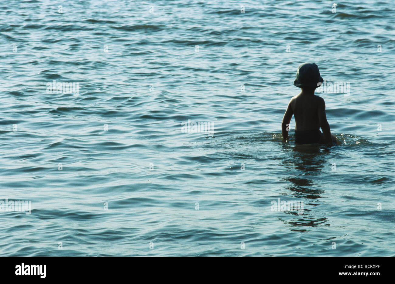 Girls wading in sea hi-res stock photography and images - Alamy