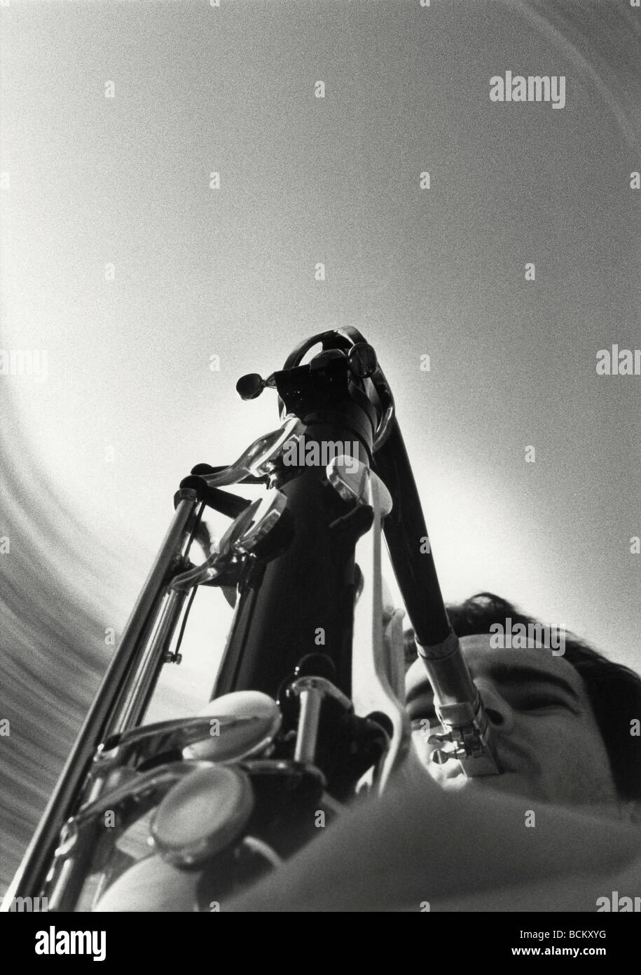 Playing saxophone low angle view hi-res stock photography and images ...