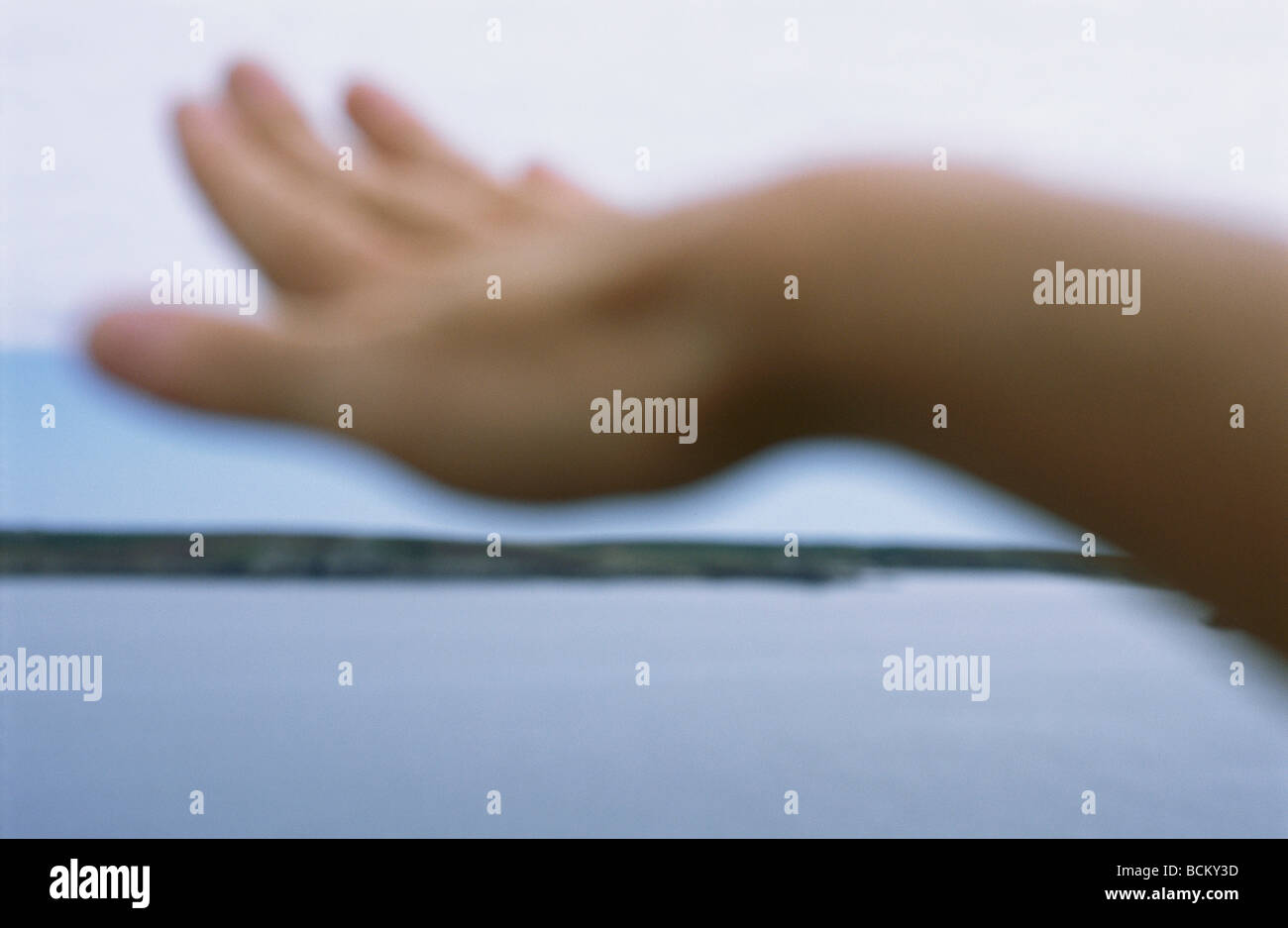 Person's hand, blurred Stock Photo - Alamy