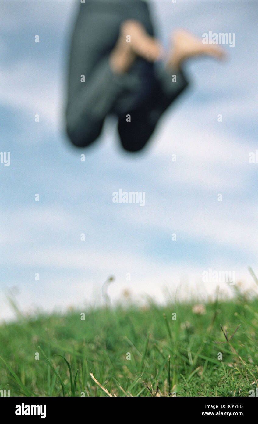 Person jumping in mid-air Stock Photo - Alamy