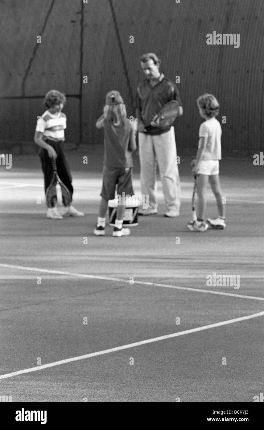 Tennis lesson and children hi-res stock photography and images - Alamy
