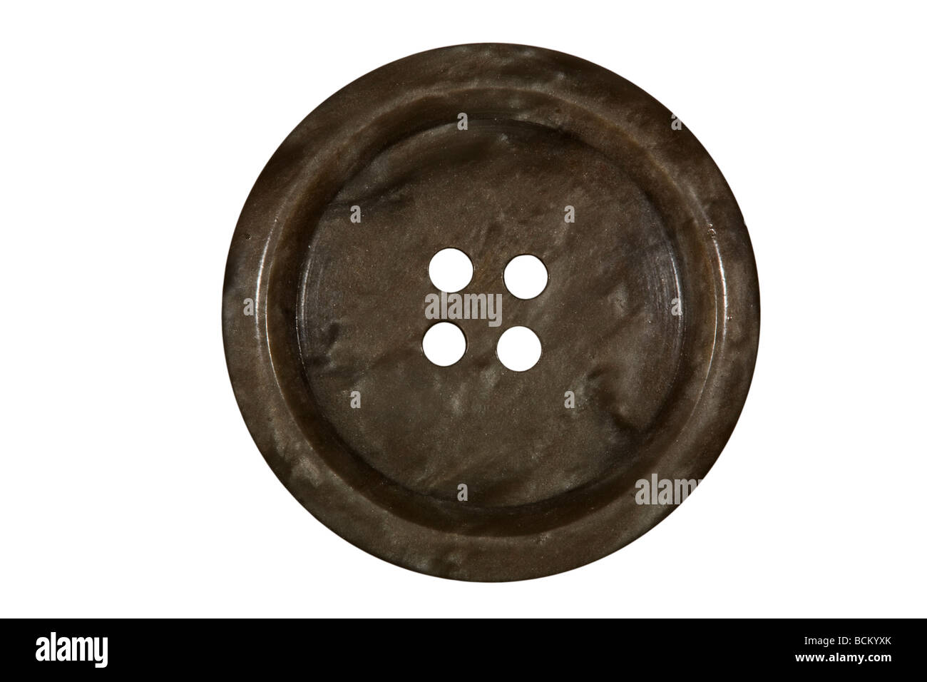 Dark brown coloured button Stock Photo - Alamy