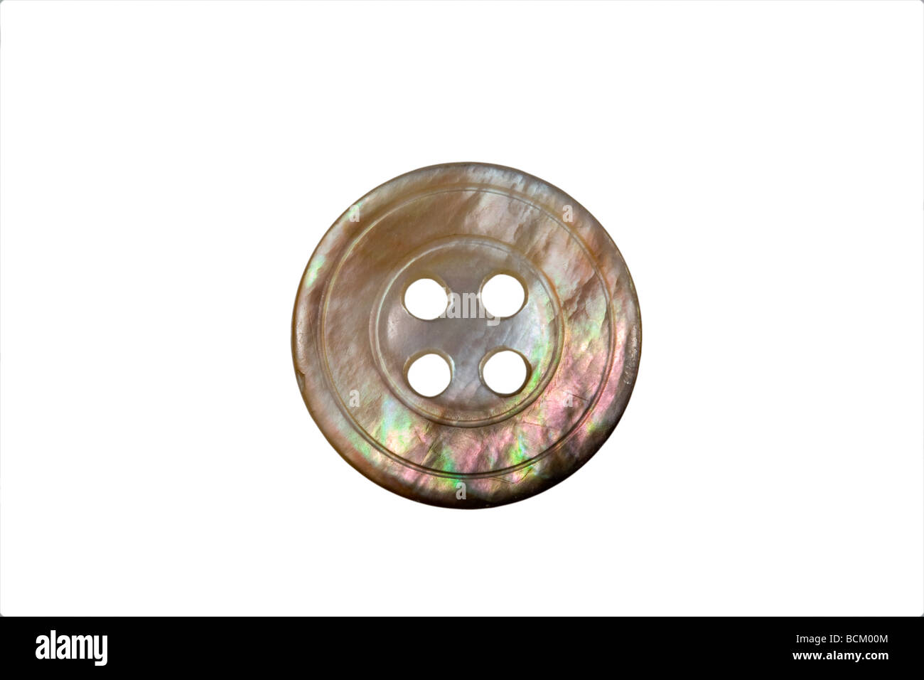 Mother of pearl coloured button Stock Photo - Alamy