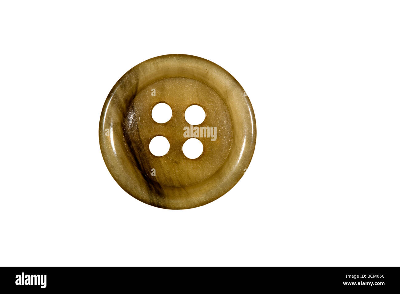 Brown coloured button Stock Photo - Alamy