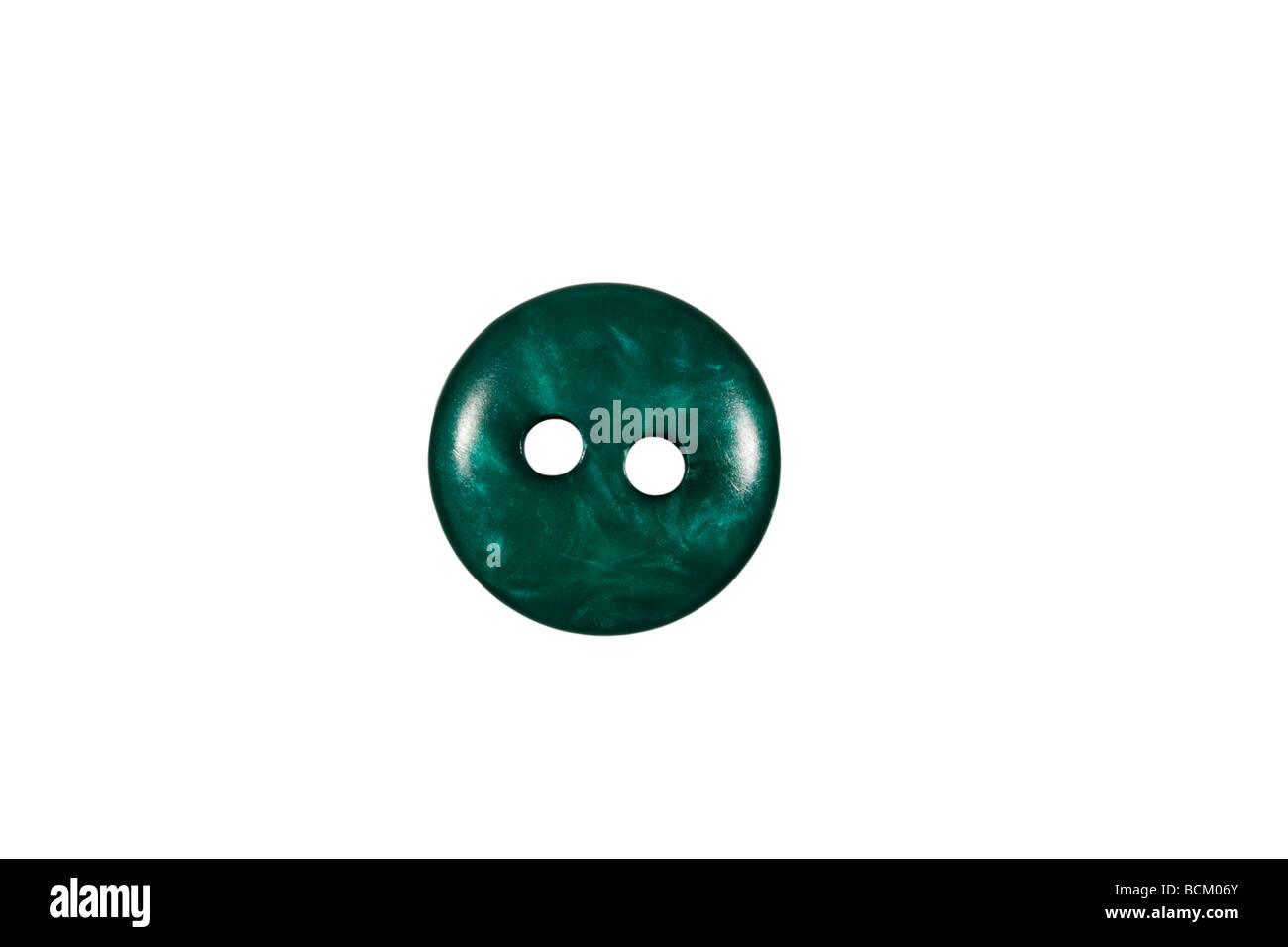 Green coloured button Stock Photo - Alamy