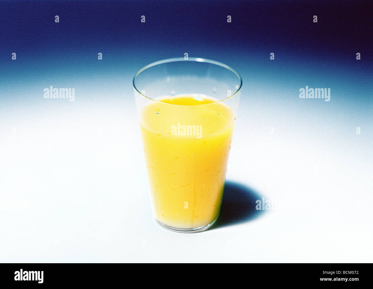 Glass of orange juice Stock Photo - Alamy