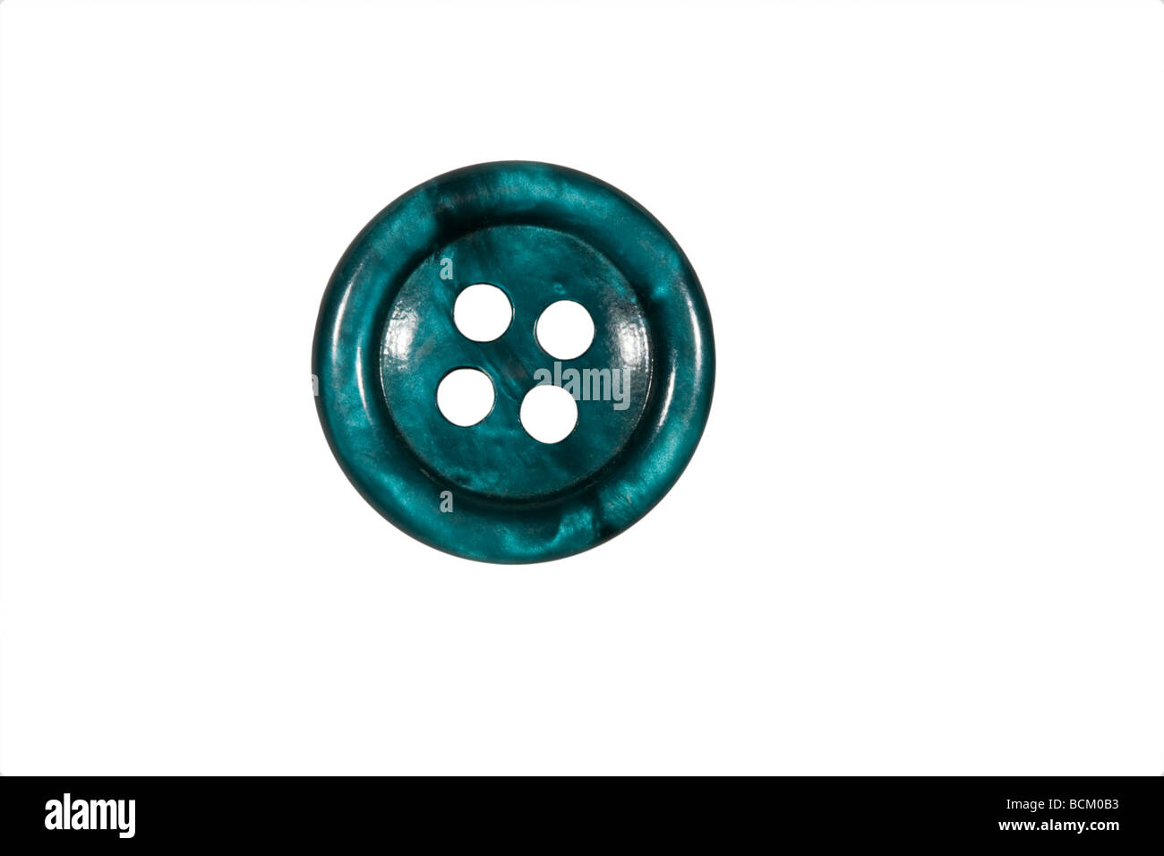 Blue coloured button Stock Photo - Alamy