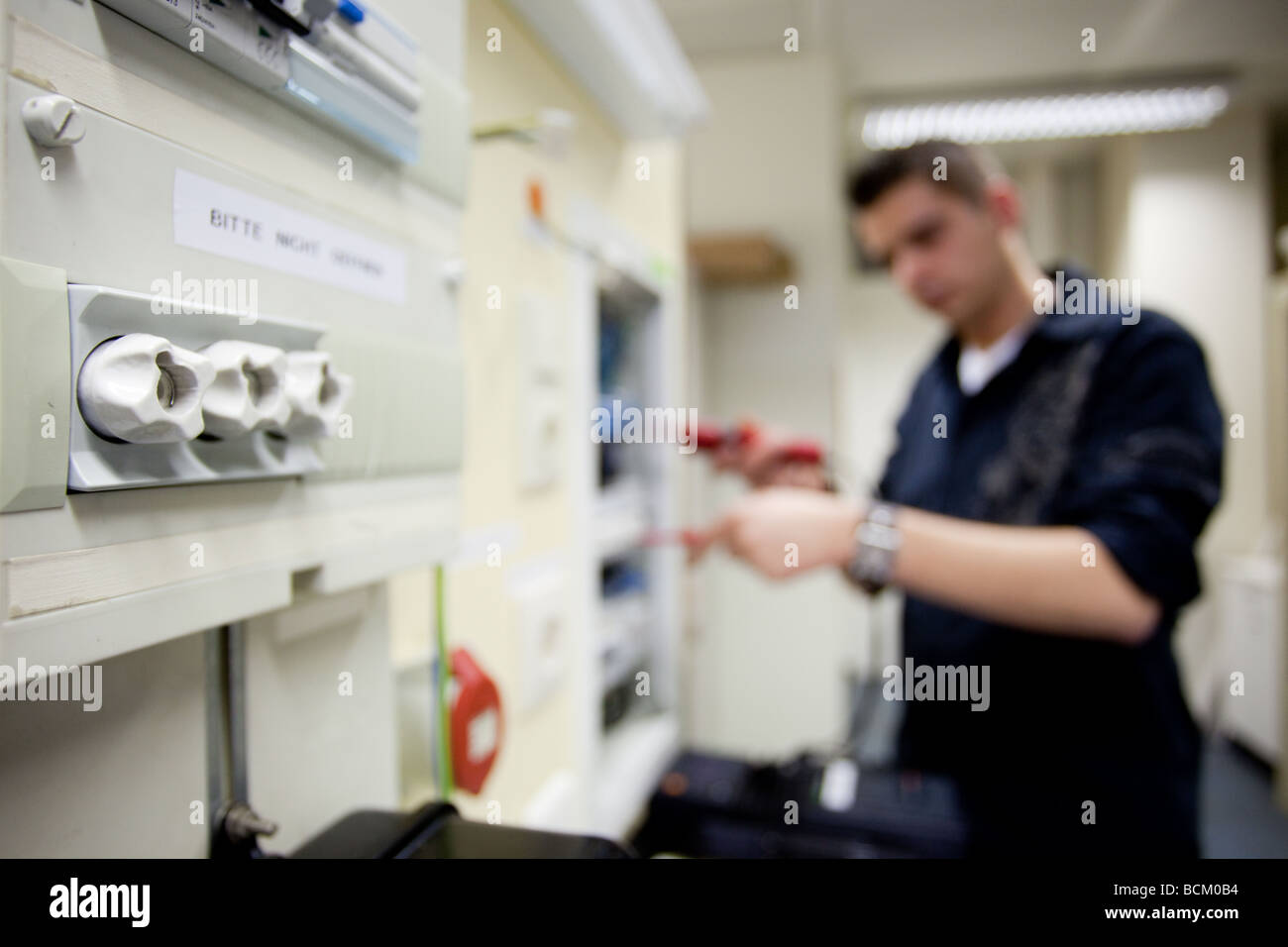 Electrician at work in the training school for master craftsmen Stock ...