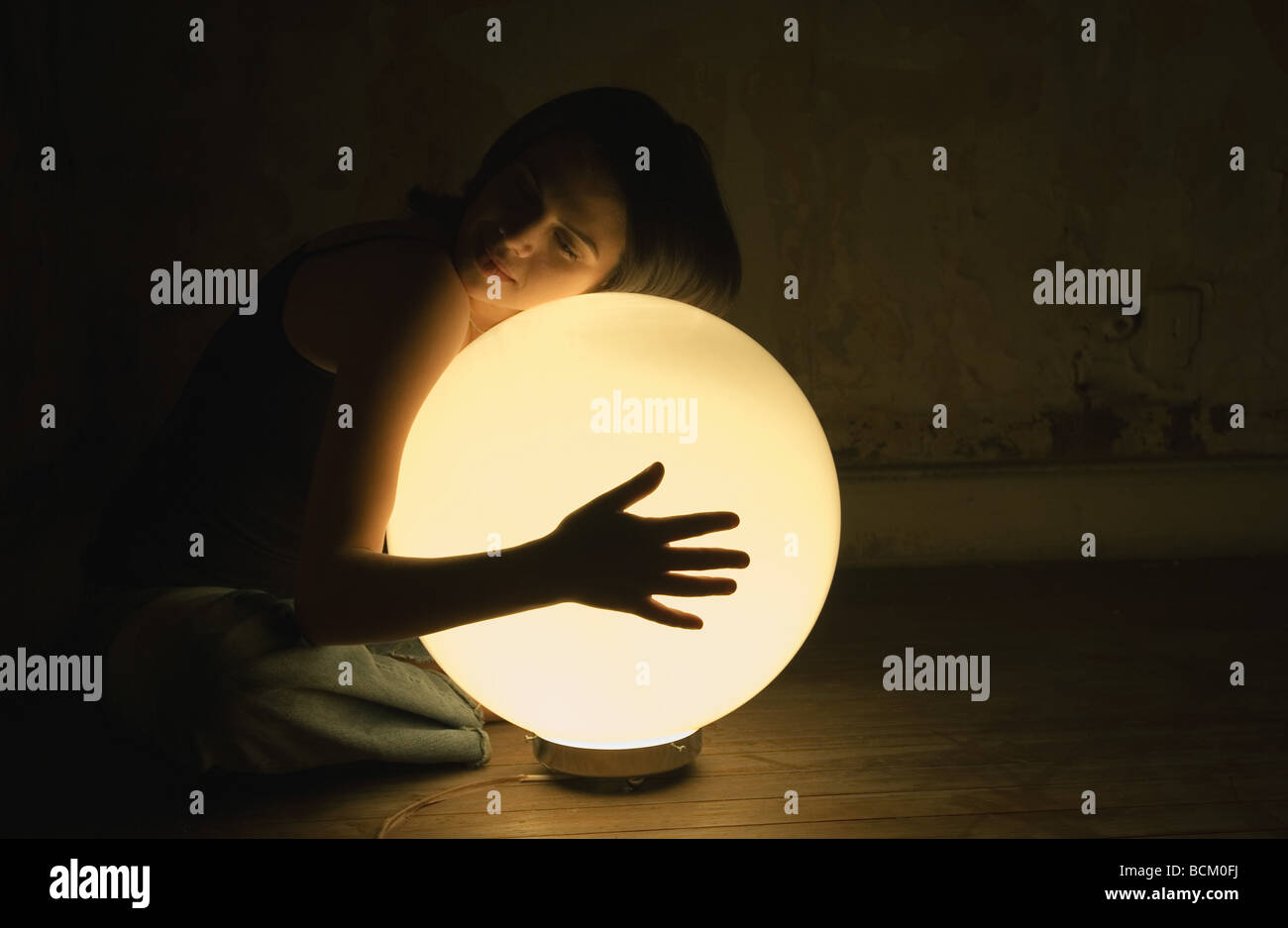 Woman holding an orb hi-res stock photography and images - Alamy