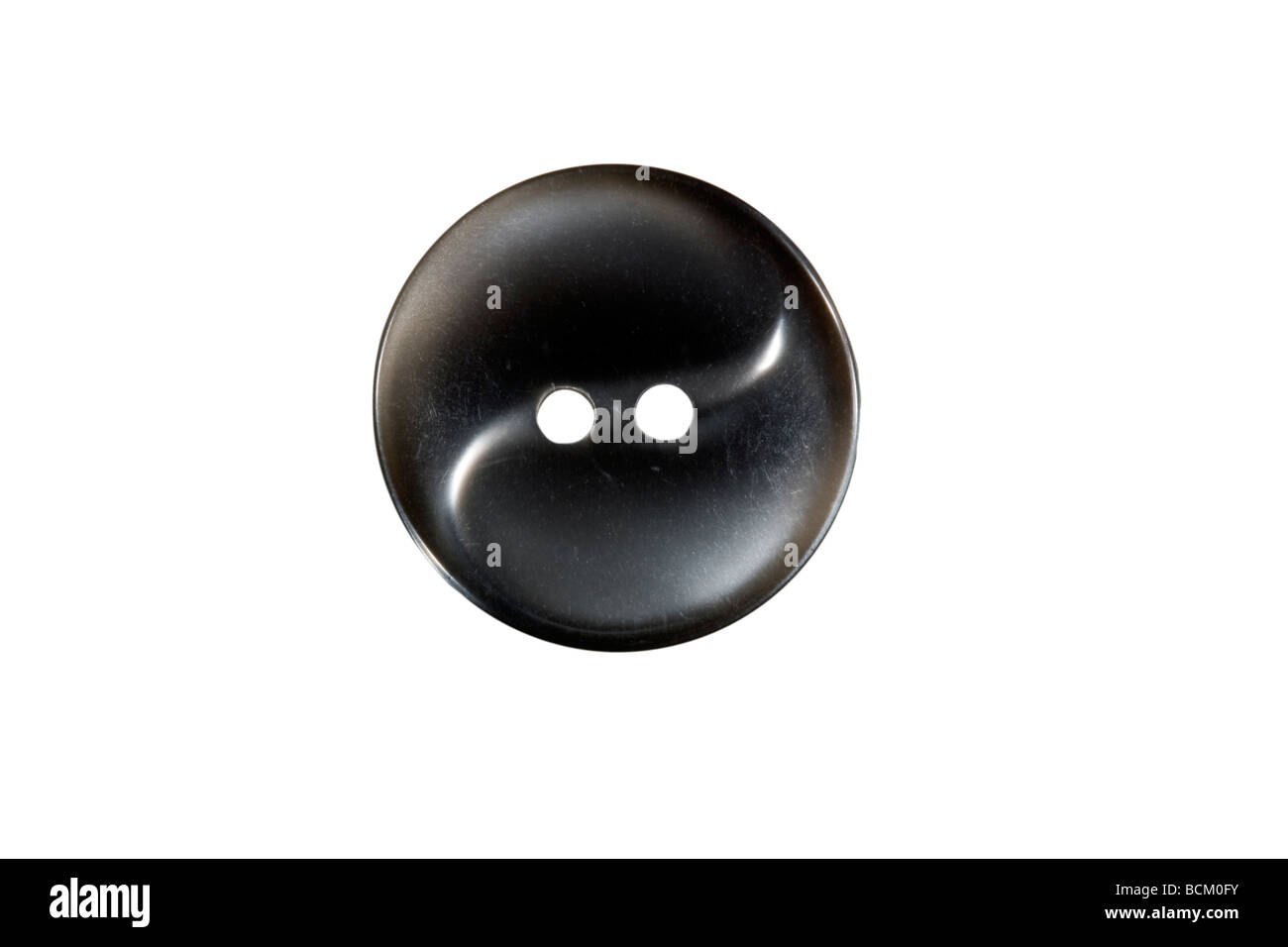 Black coloured button Stock Photo - Alamy